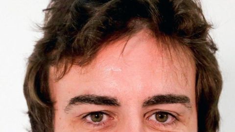 And Fernando Alonso wins his first Grand Prix and he becomes the...